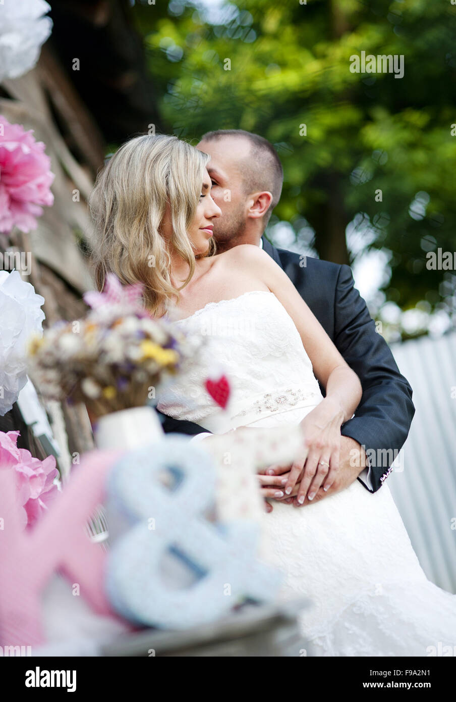 Beautiful bride and groom at their vintage style wedding Stock Photo ...