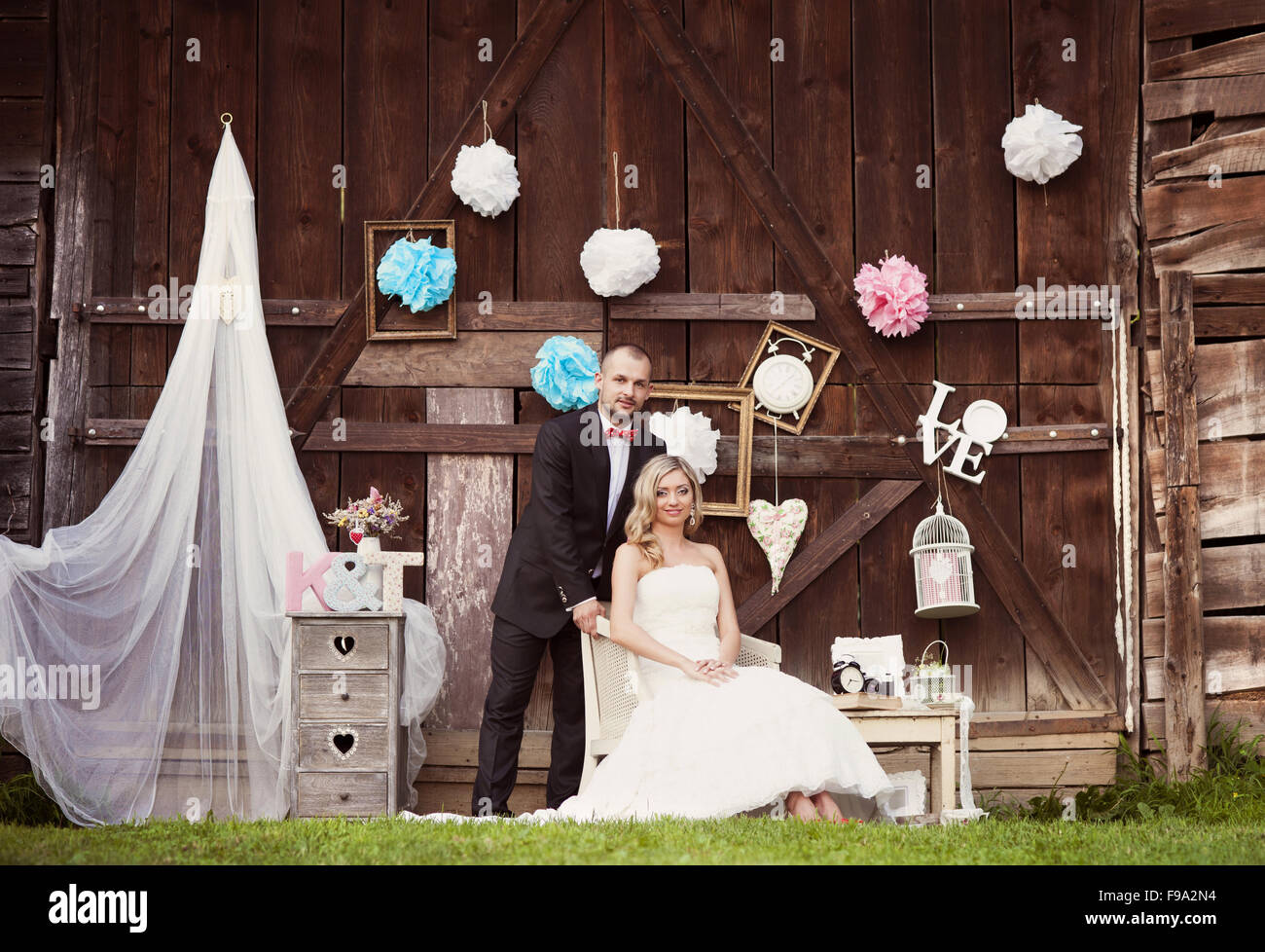 Beautiful bride and groom at their vintage style wedding Stock Photo ...