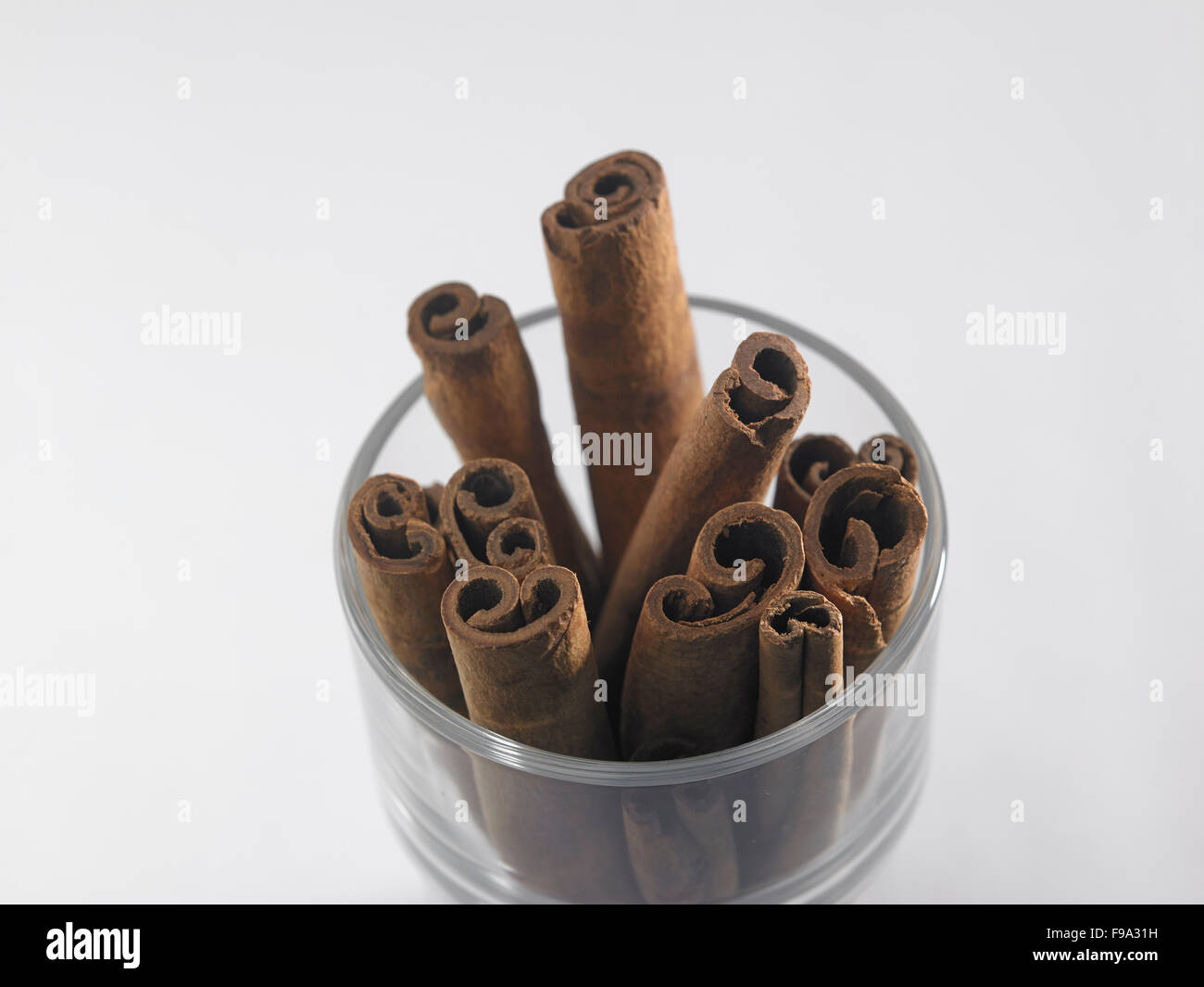 cinnamon in a glass container Stock Photo - Alamy