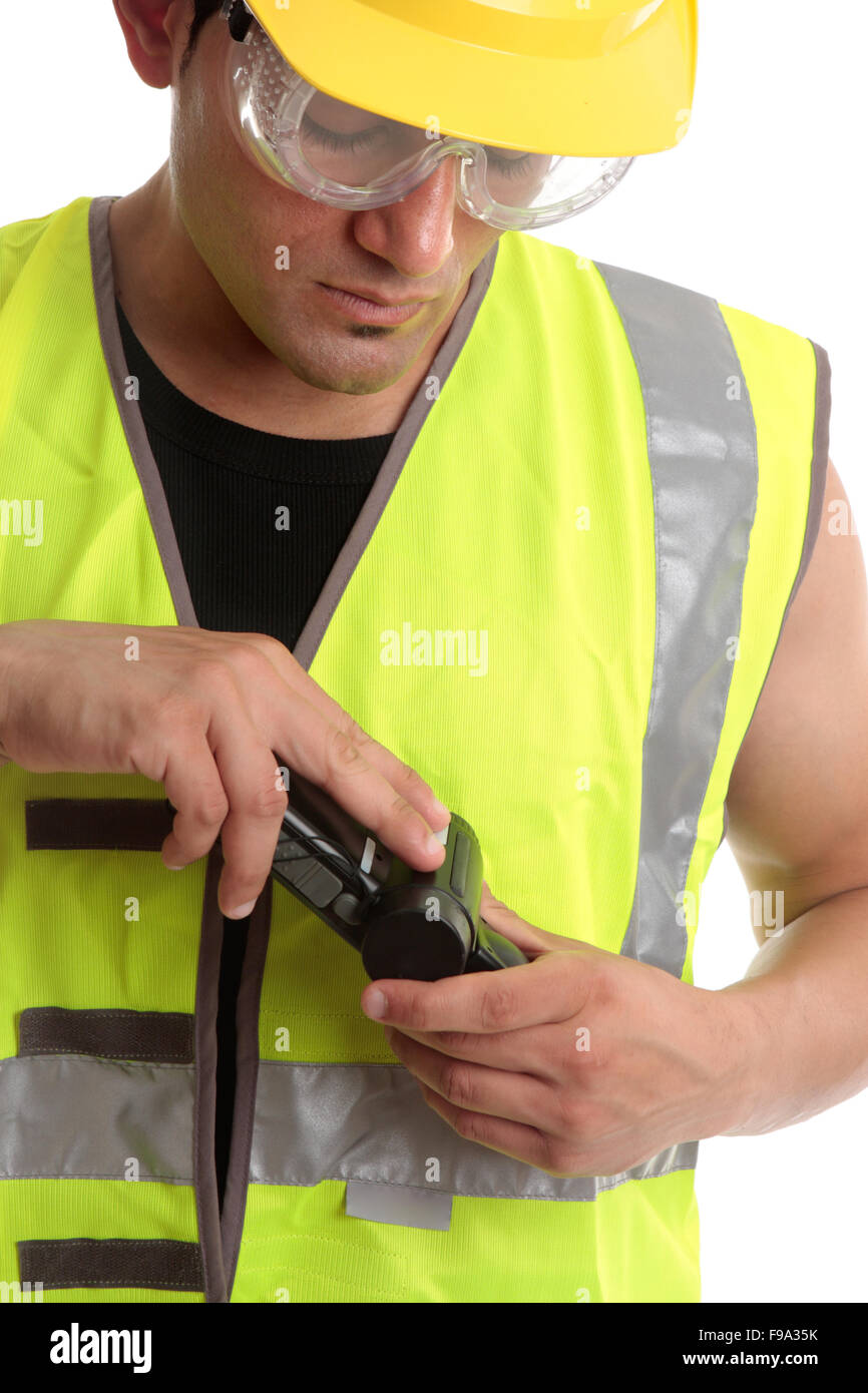 Builder with measuring device Stock Photo - Alamy