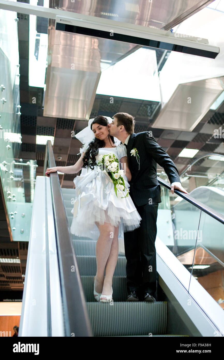 bride and groom in metro Stock Photo - Alamy