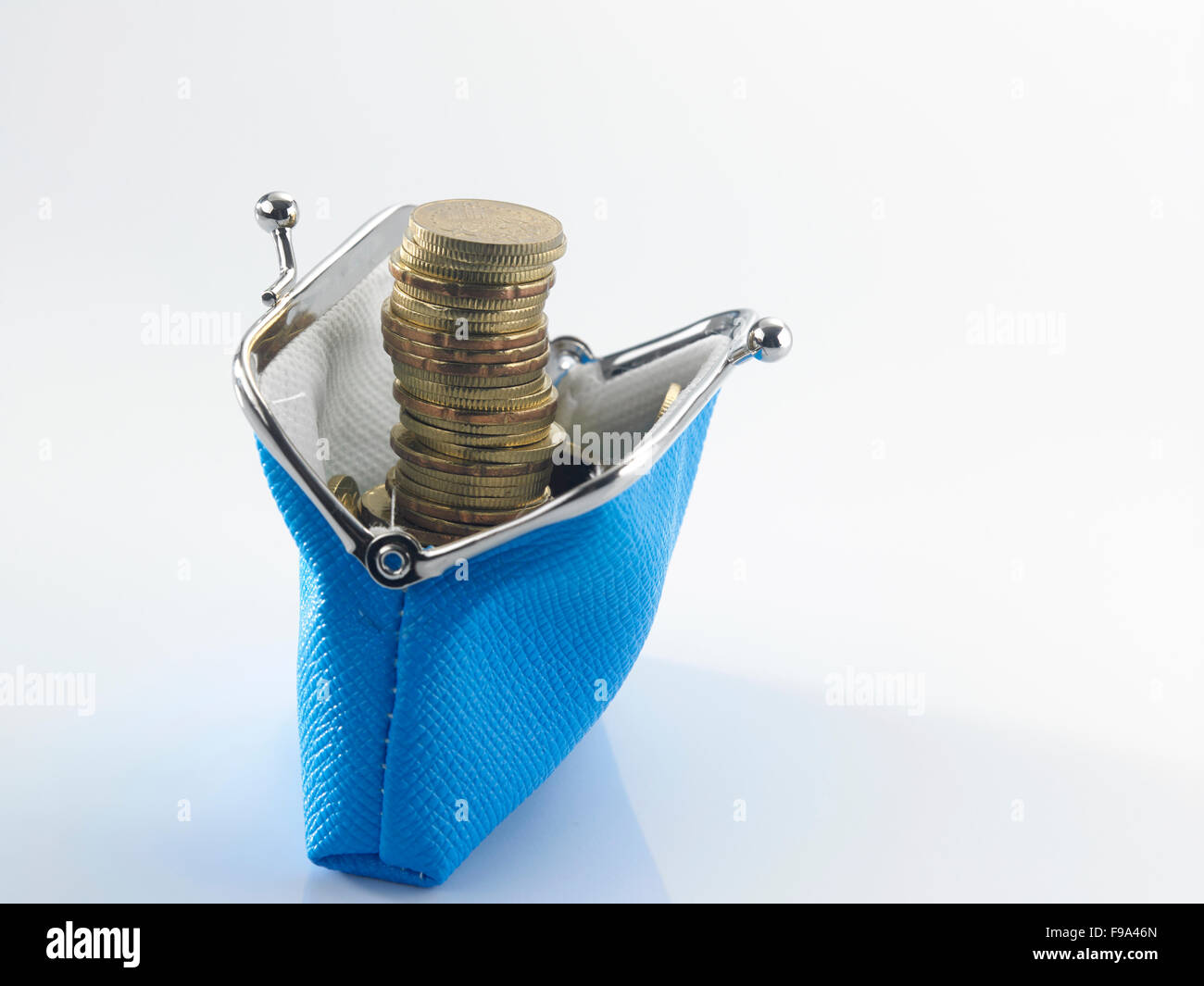 coins in the blue color purse Stock Photo - Alamy