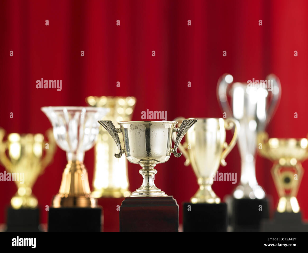 group with trophy in front of stage Stock Photo - Alamy