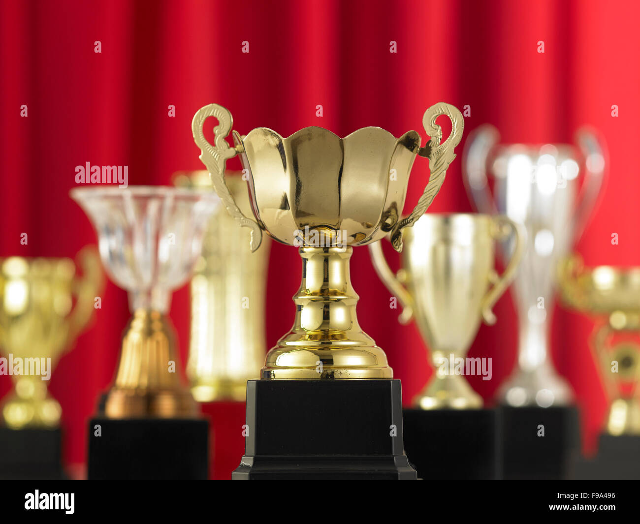 group with trophy in front of stage Stock Photo - Alamy