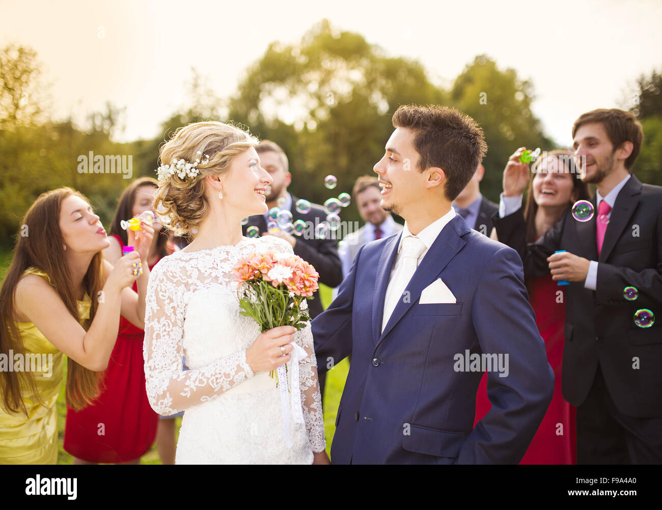 Young newlyweds enjoying romantic moment together at wedding reception ...