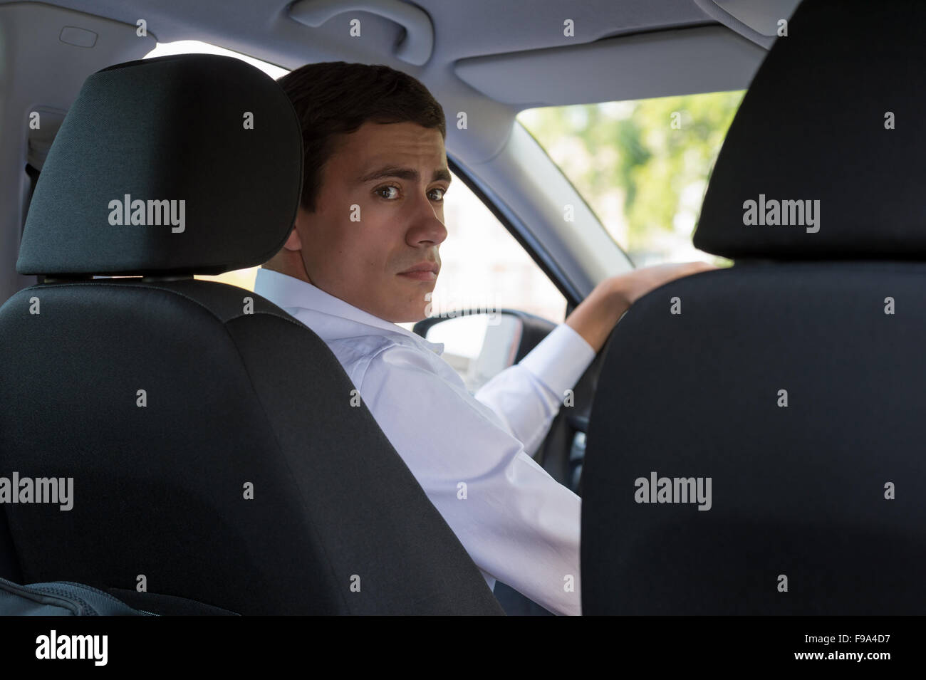 Driver behind wheel of car hi-res stock photography and images - Alamy