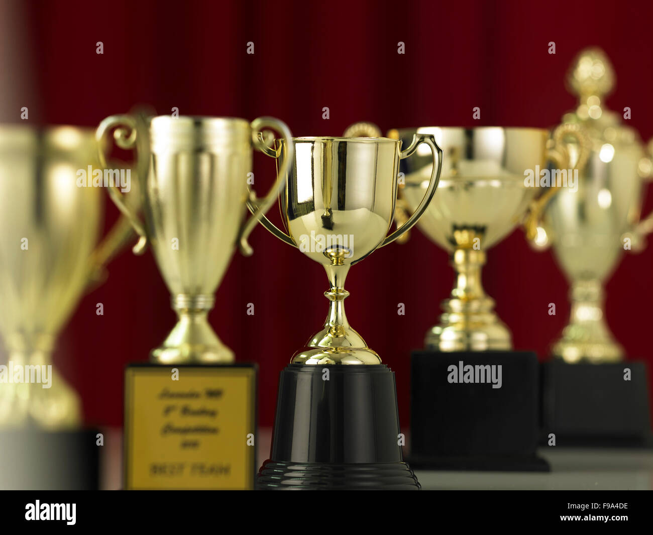 group with trophy in front of stage Stock Photo - Alamy