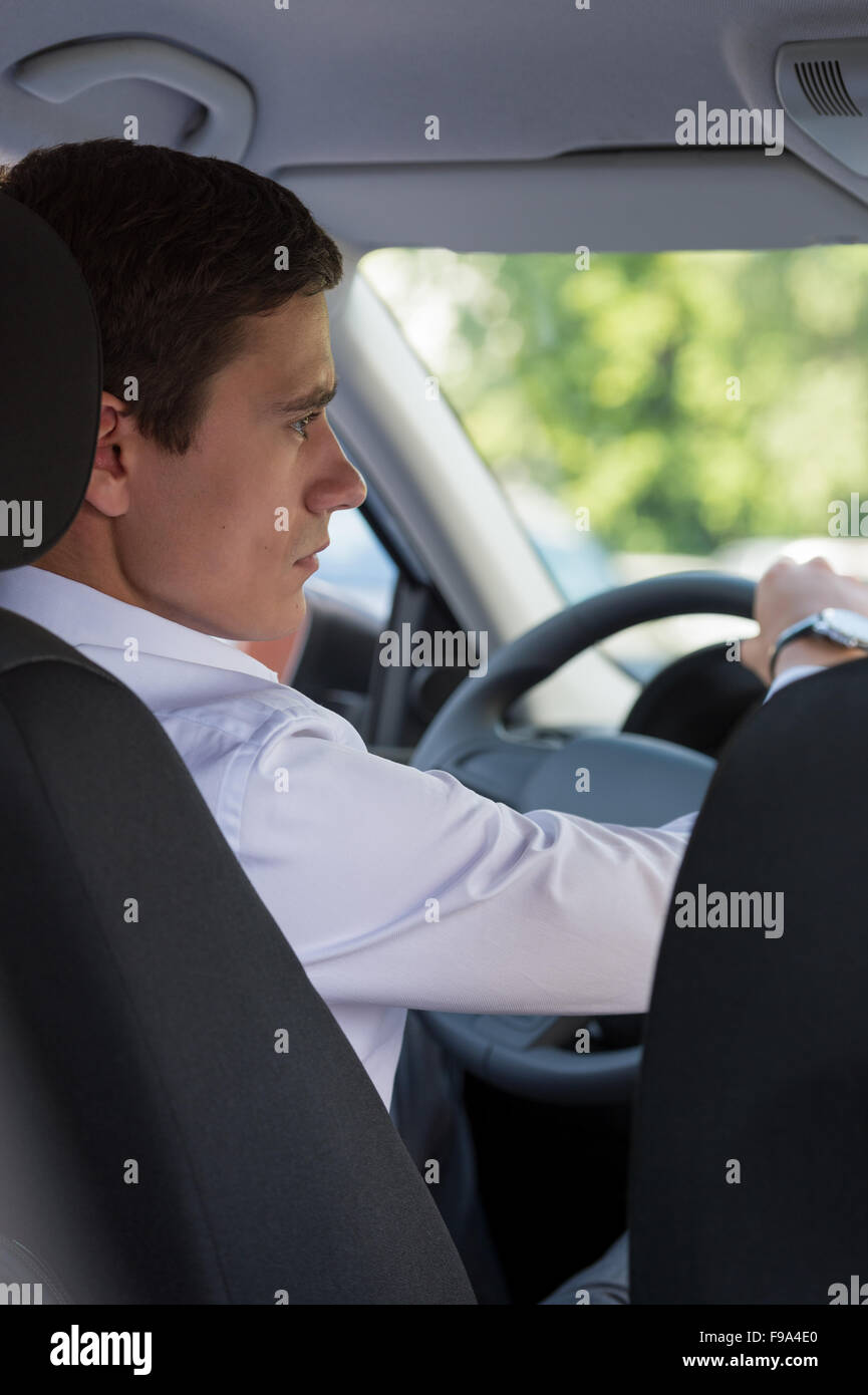 Young black driver behind wheel hi-res stock photography and images - Alamy