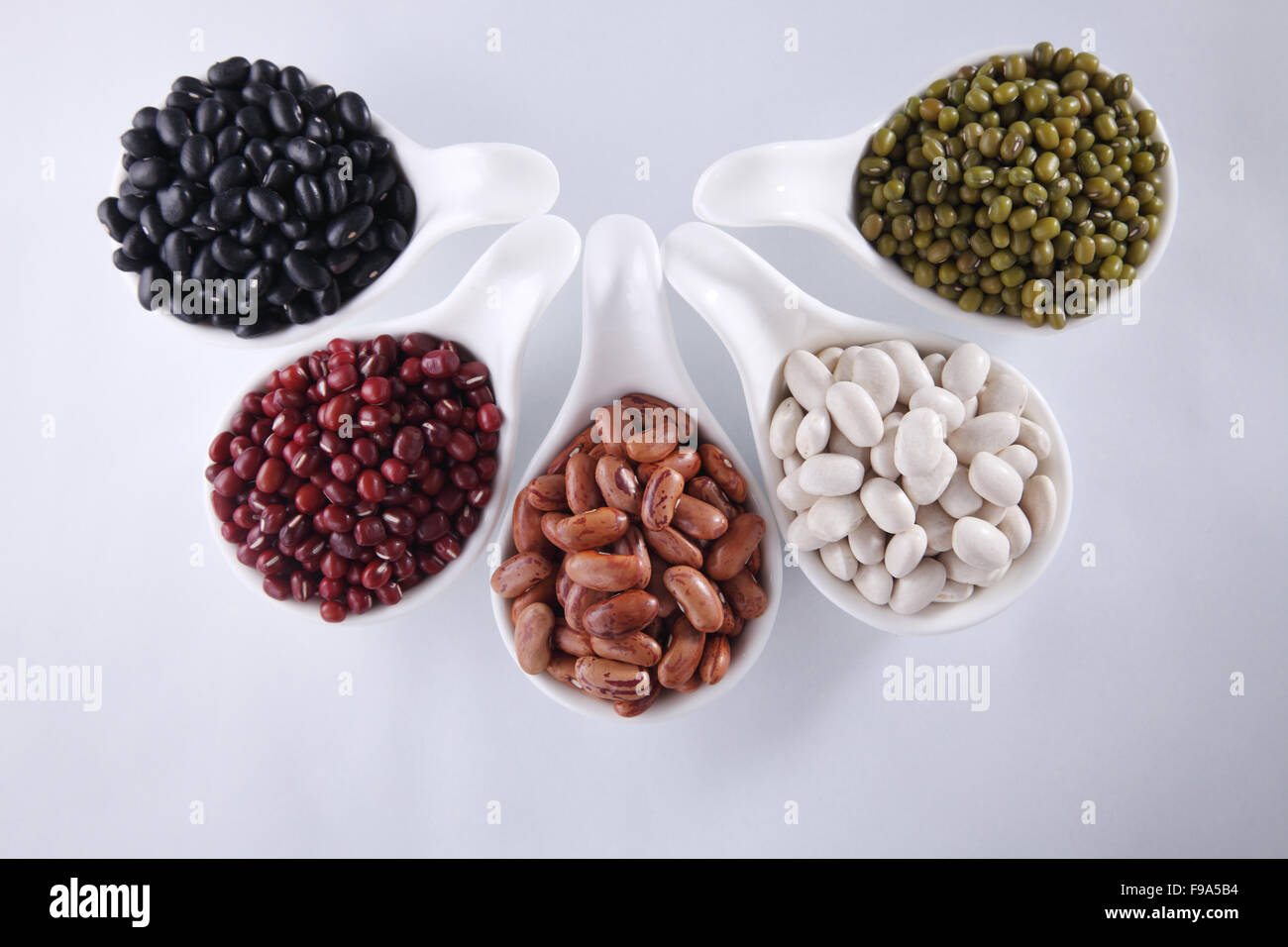 five different colour organic soup beans Stock Photo - Alamy