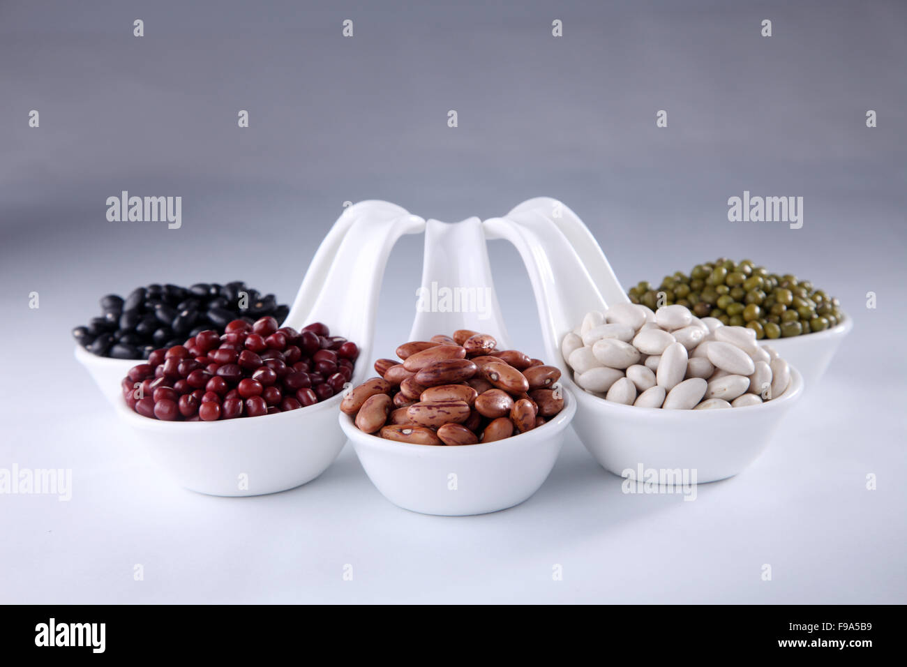 five different colour organic soup beans Stock Photo - Alamy