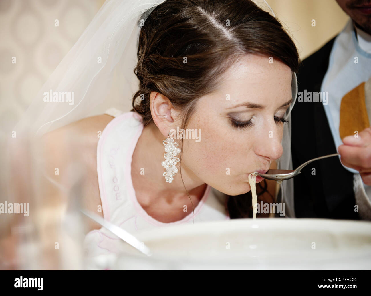 Bride eating hi-res stock photography and images - Alamy