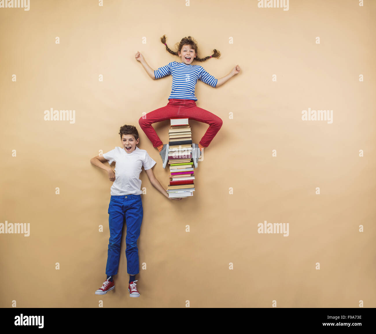 Happy children playing hi-res stock photography and images - Alamy