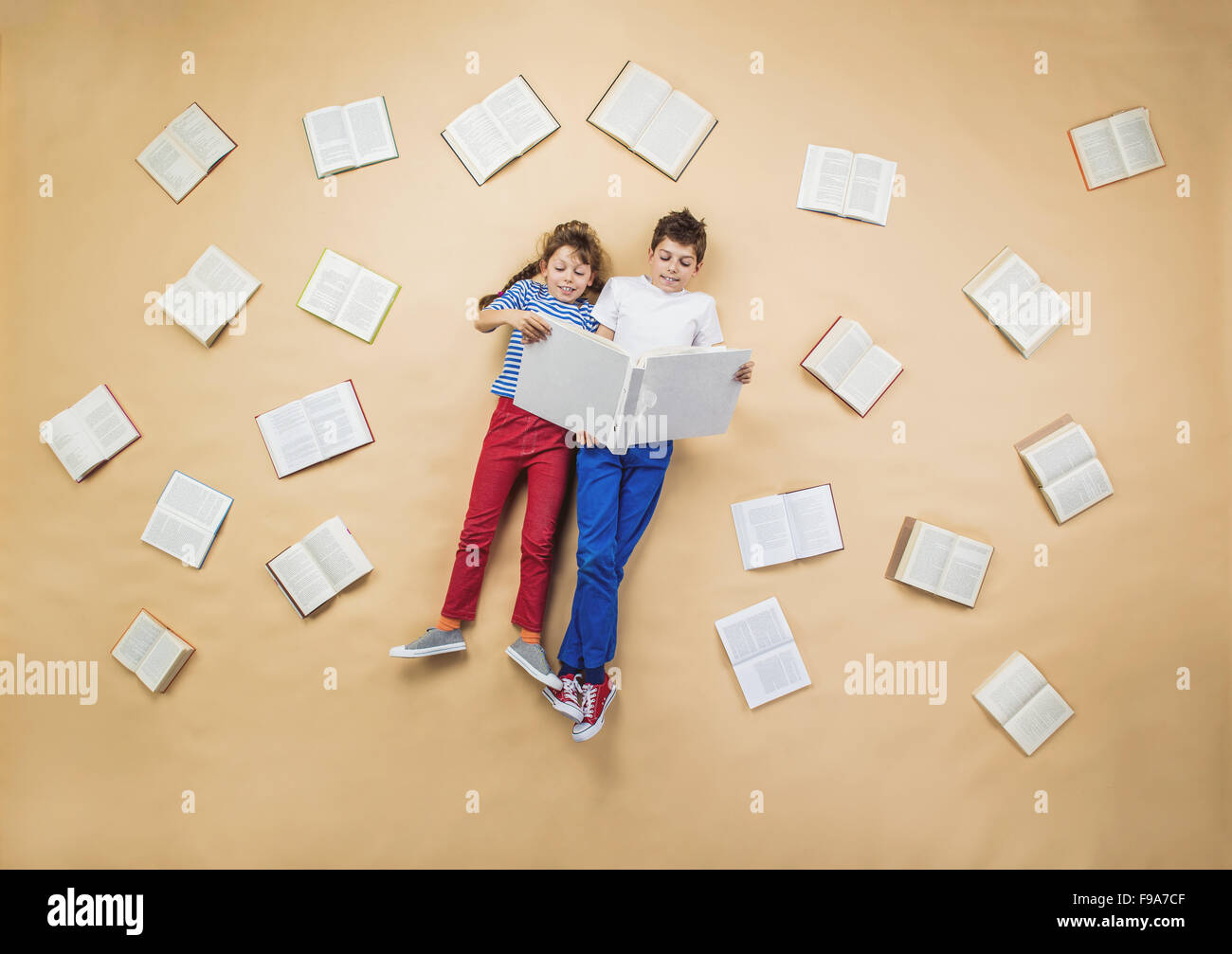 Children are reading book hi-res stock photography and images - Alamy