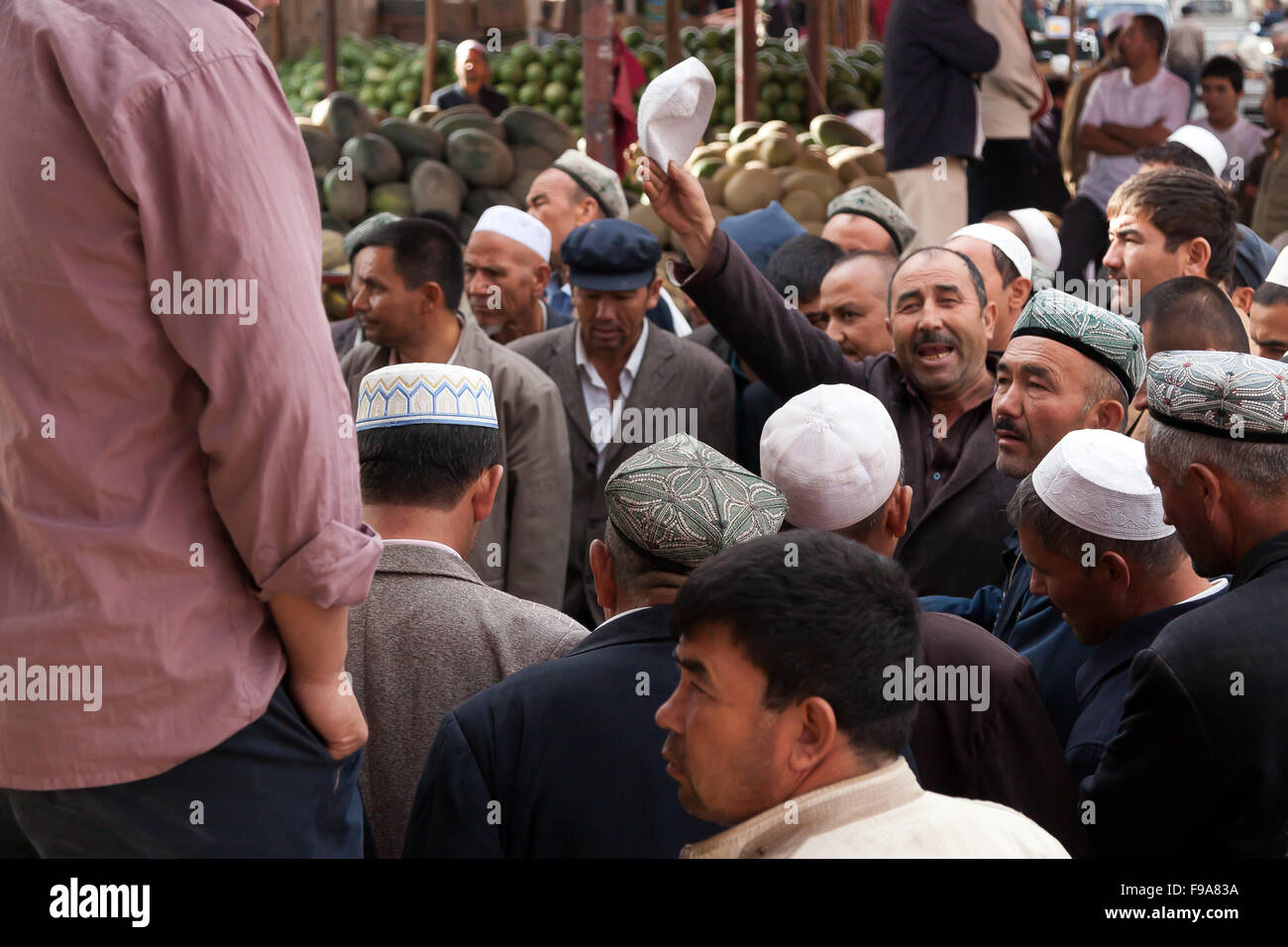 Tenders on the famous animal market in Kashgar. Xinjiang Autonomous ...