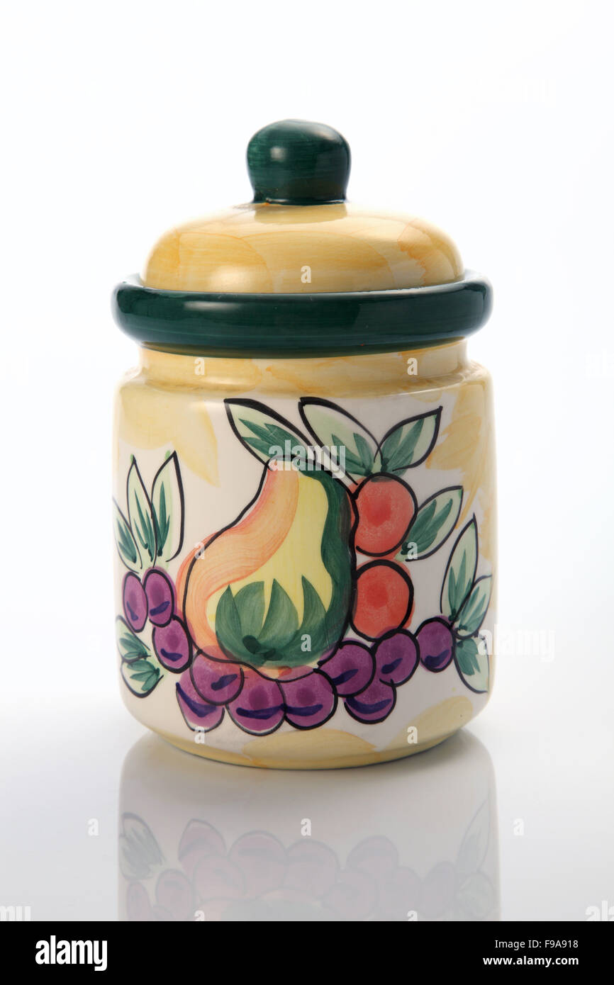 yellow color porcelain jar on the white background Stock Photo - Alamy