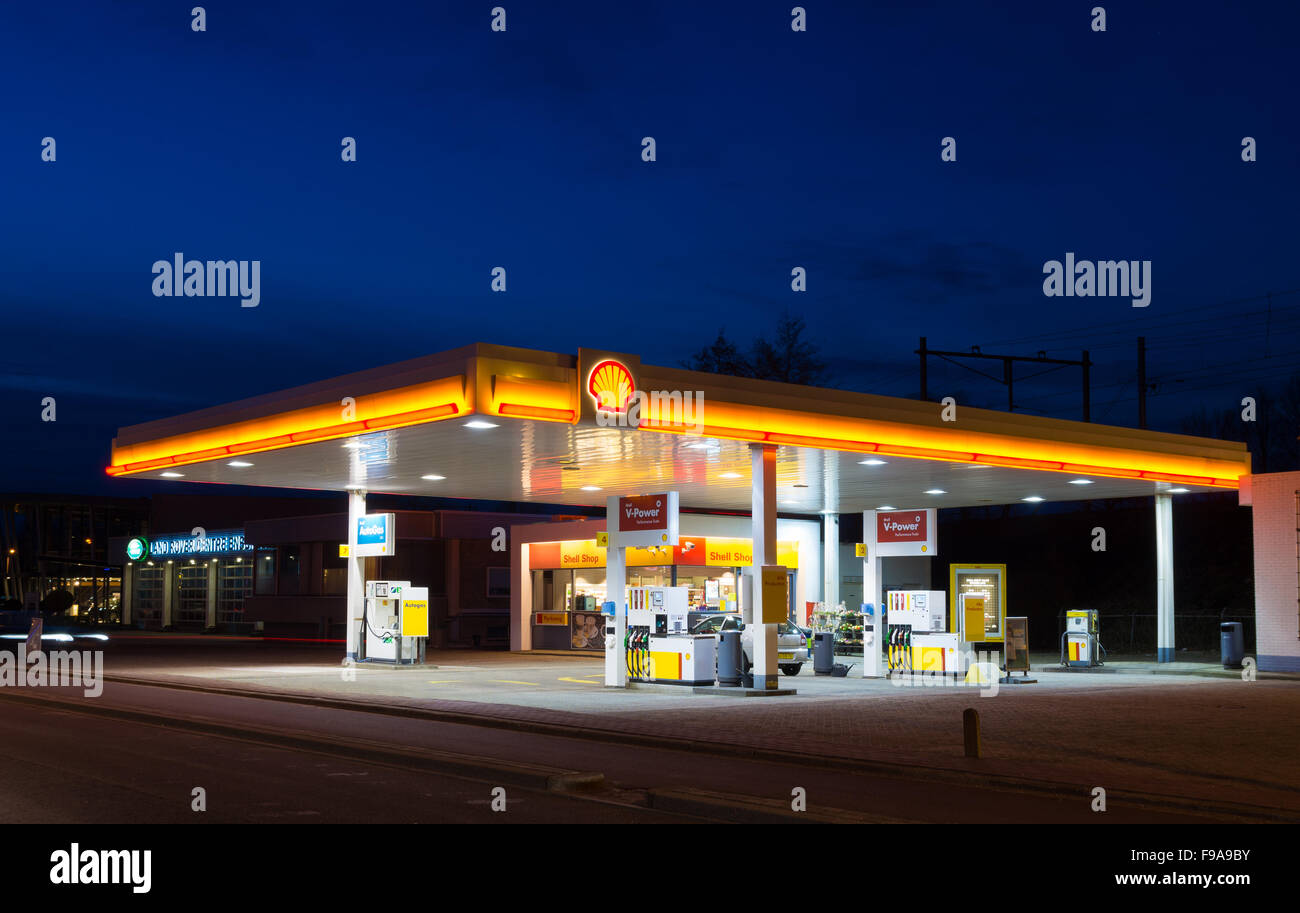 ENSCHEDE, NETHERLANDS - FEBRUARY 28, 2015: Shell gas station at night ... ENSCHEDE, NETHERLANDS - FEBRUARY 28, 2015: Shell gas station at night ...