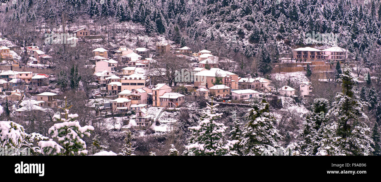View of Athanasios Diakos village at the foot of the snowy Vardousia ...