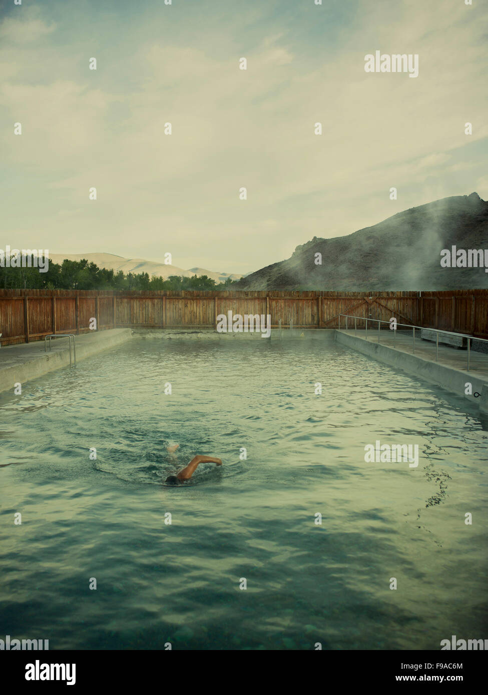 A man swims in a hot springs pool in Idaho Stock Photo - Alamy