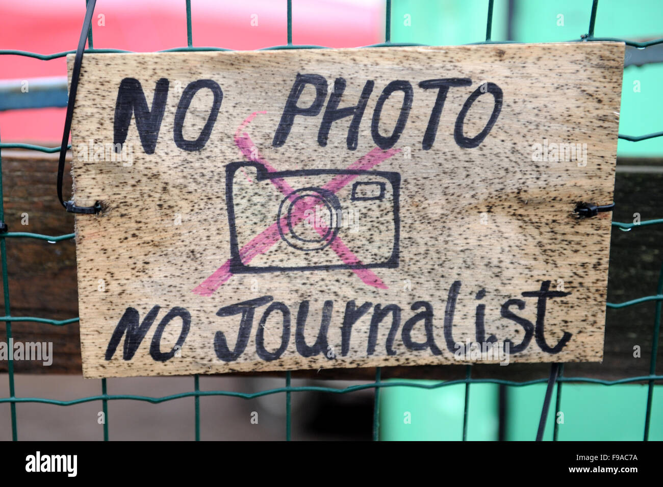 Hand made No Photographs, No Journalists sign on the entrance to the ...