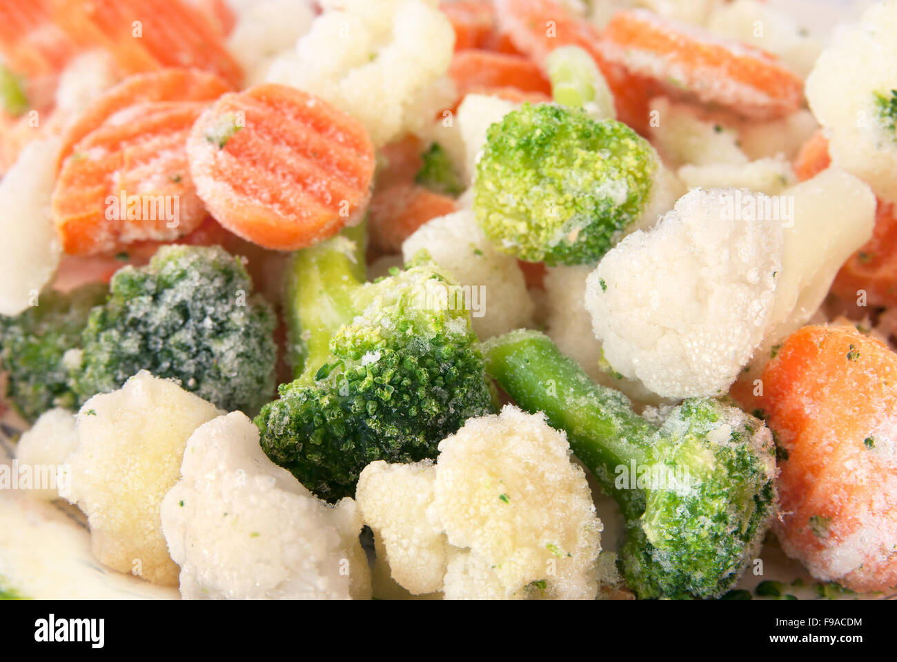 Frozen vegetables mix Stock Photo - Alamy
