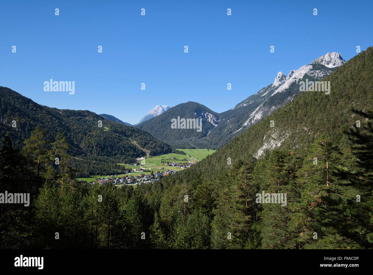 village Scharnitz surrounded by mountains, Tyrol, Austria Stock Photo ...