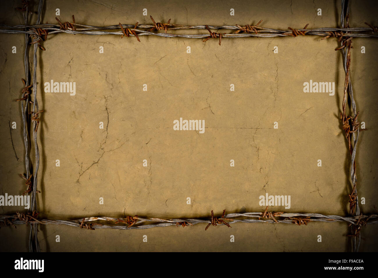 frame made of barbed wire on the brown background Stock Photo - Alamy