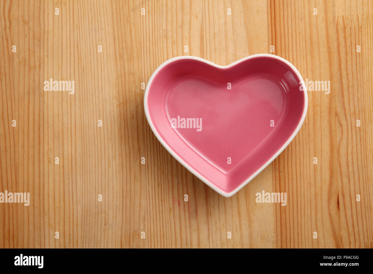 Empty heart shaped ceramic bowl Stock Photo - Alamy