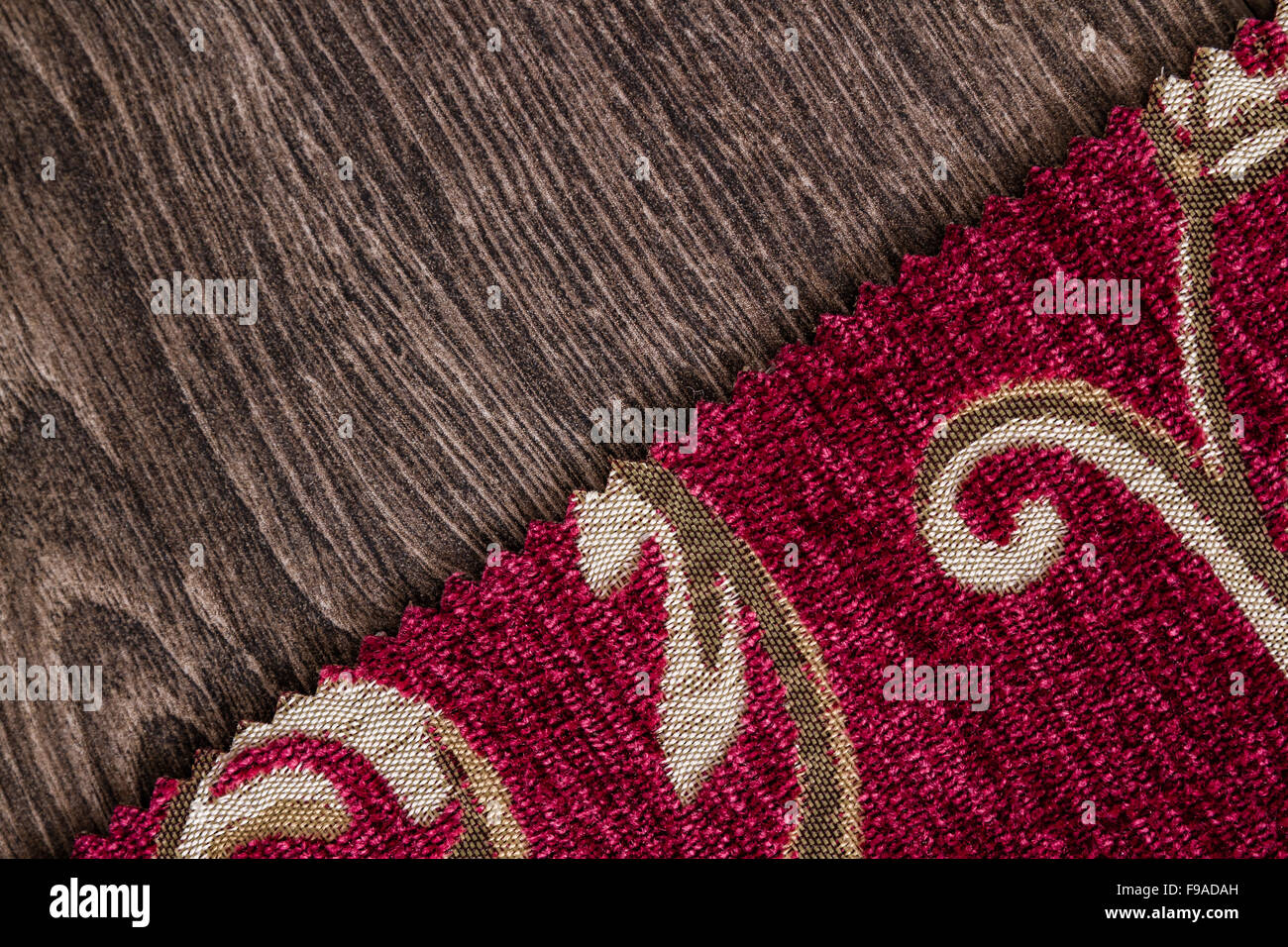 Close up detail of red color fabric texture background with flower ...