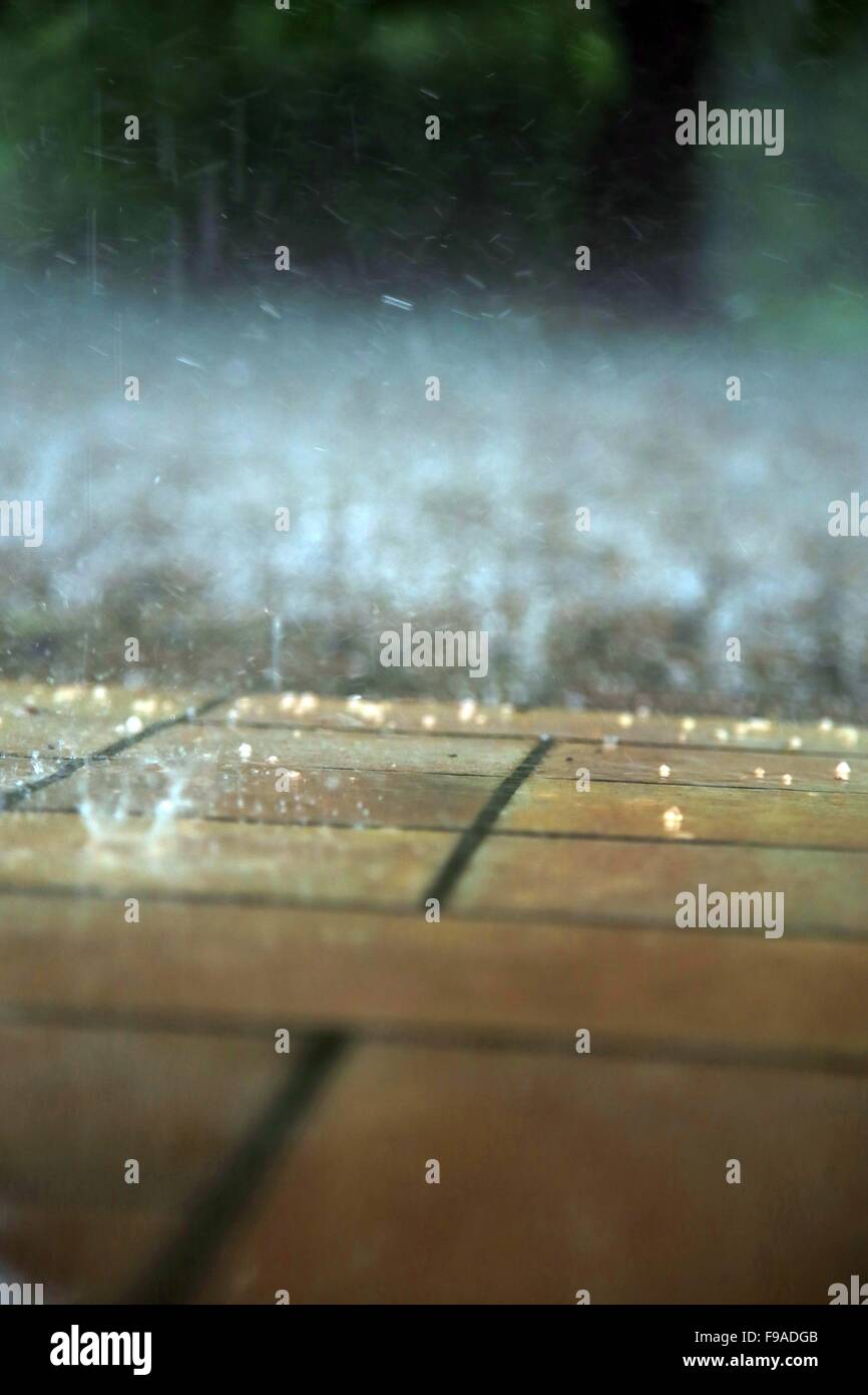 heavy rain on a external floor Stock Photo - Alamy