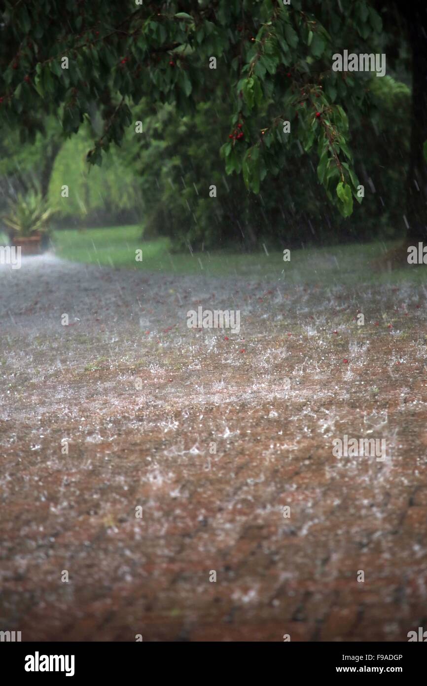 heavy rain on a external floor Stock Photo - Alamy