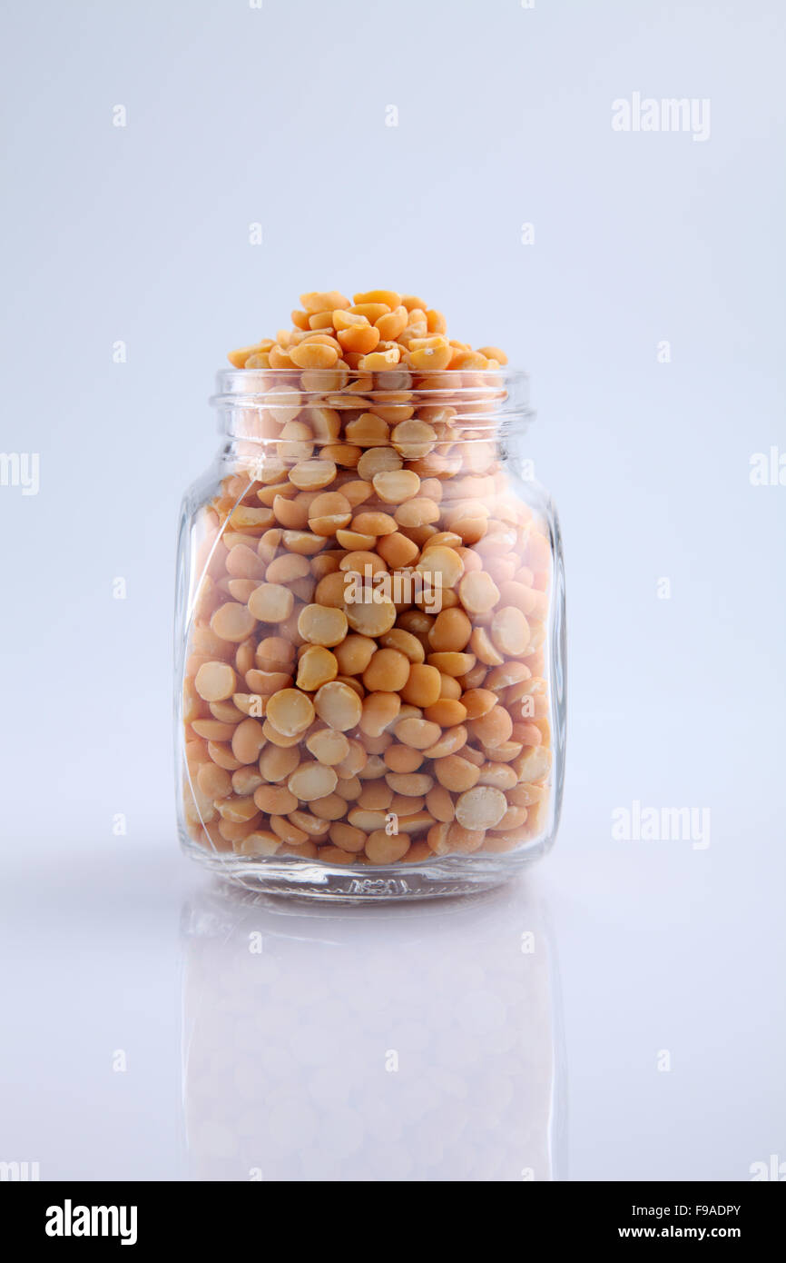 uncooked indian dhal lentil in a glass container Stock Photo - Alamy