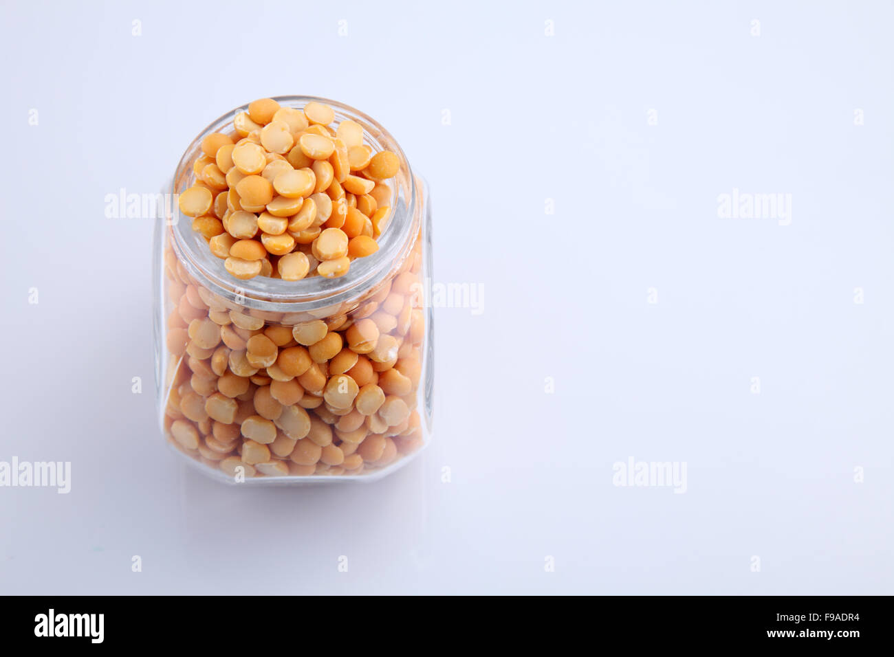 uncooked indian dhal lentil in a glass container Stock Photo - Alamy