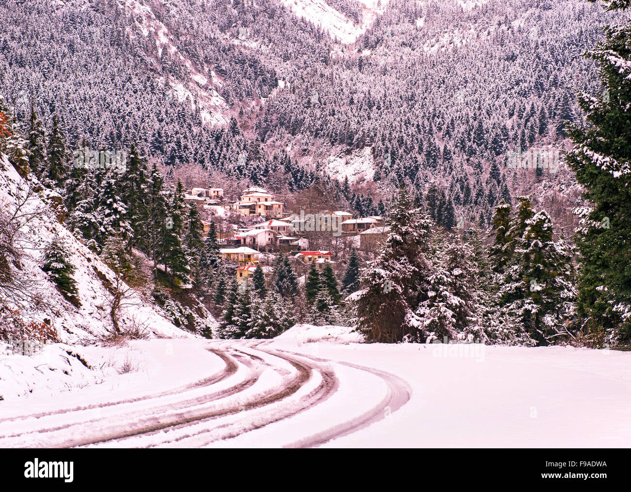 View of Athanasios Diakos village at the foot of the snowy Vardousia ...