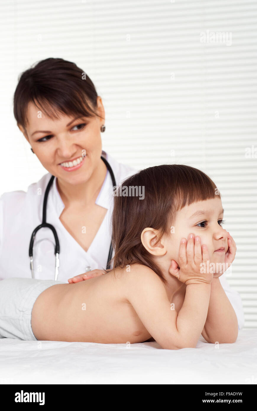 Female Doctor with child Stock Photo - Alamy