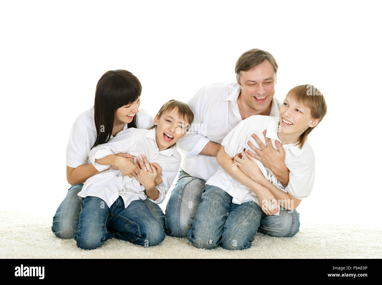 family of four people Stock Photo - Alamy