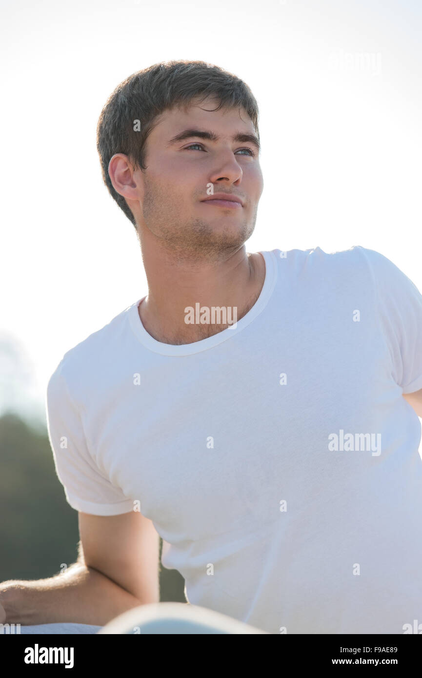 Young man with pure happiness on his face admiring sun Stock Photo - Alamy