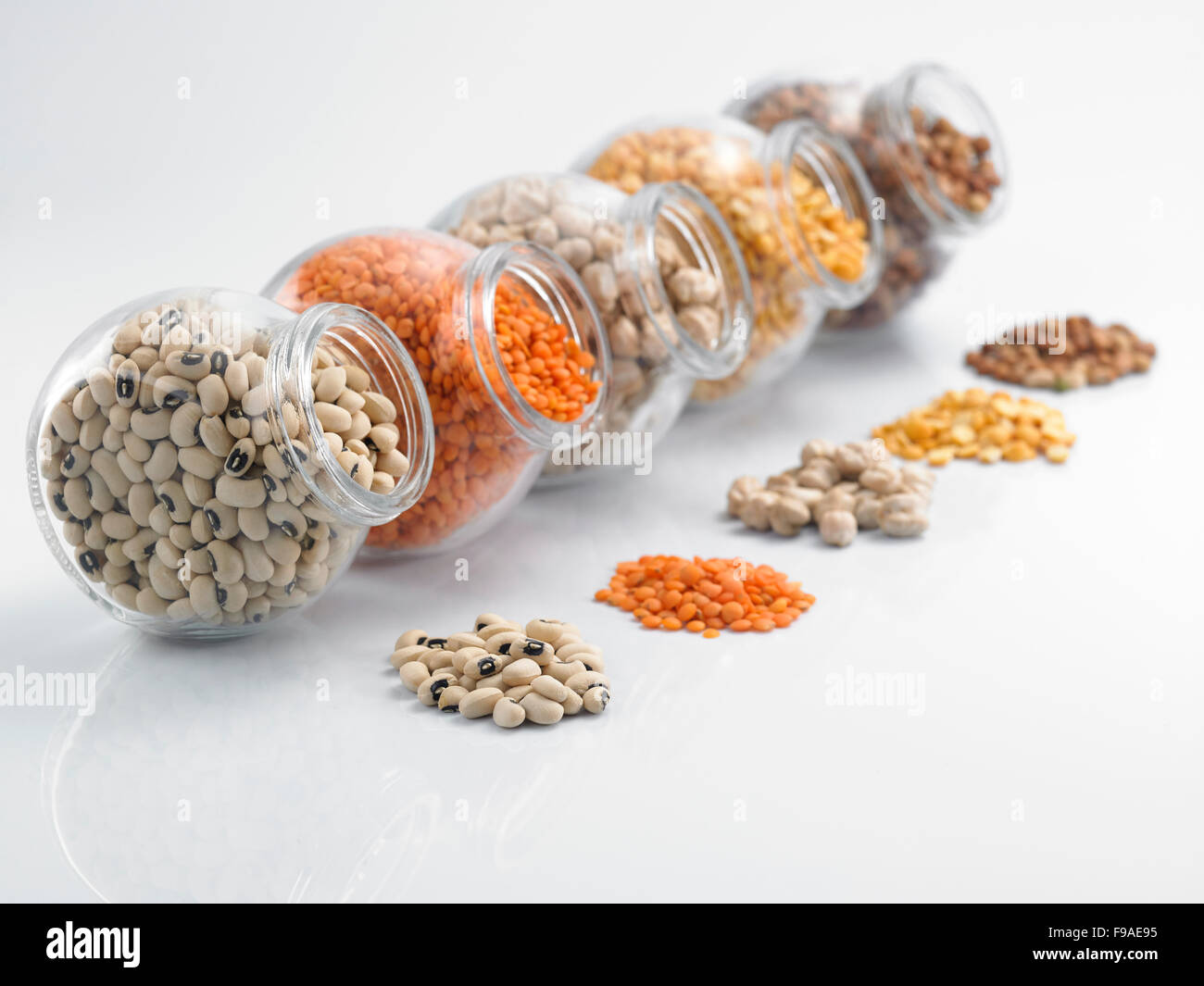 assorted beans arranged in a row Stock Photo - Alamy