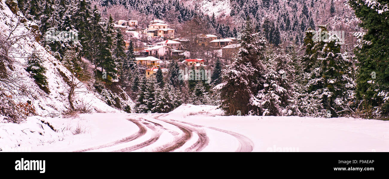 View of Athanasios Diakos village at the foot of the snowy Vardousia ...