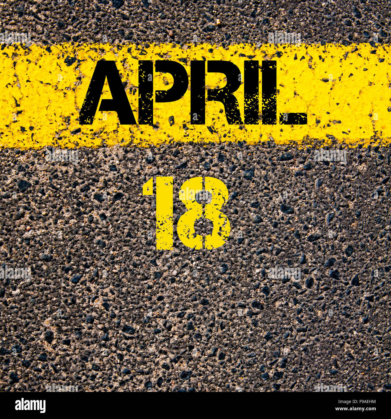 18 April calendar day written over road marking yellow paint line Stock ...