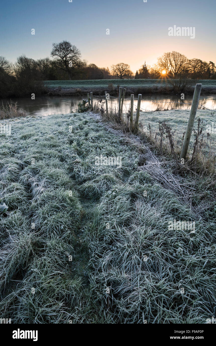Winter Sunrise Landscape Over River And Fields Covered In Frost Stock