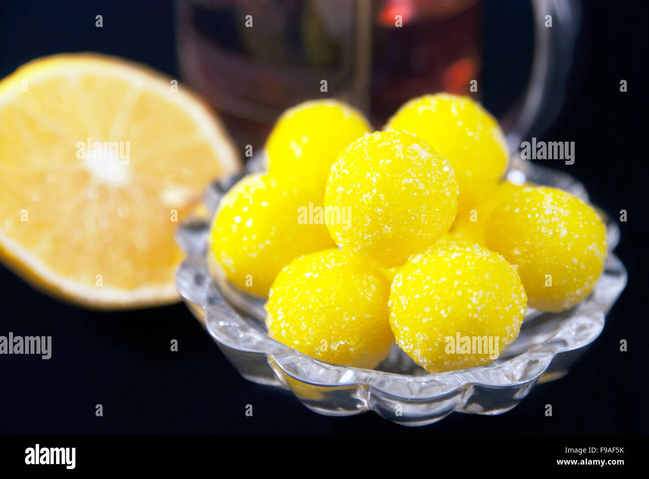 Lemon drop candy hi-res stock photography and images - Alamy