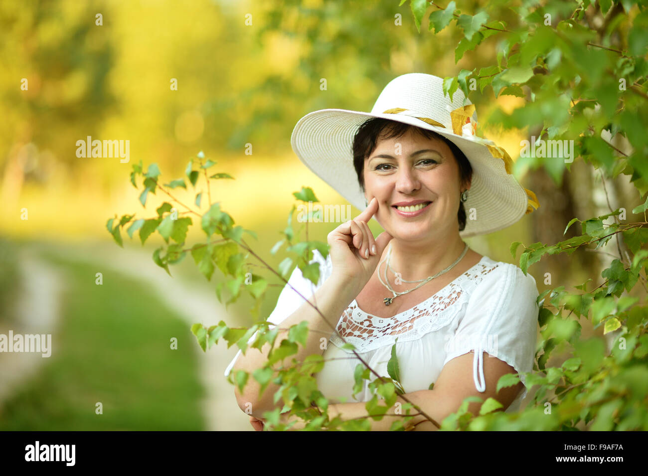 Lady enjoying summer outdoors Stock Photo - Alamy