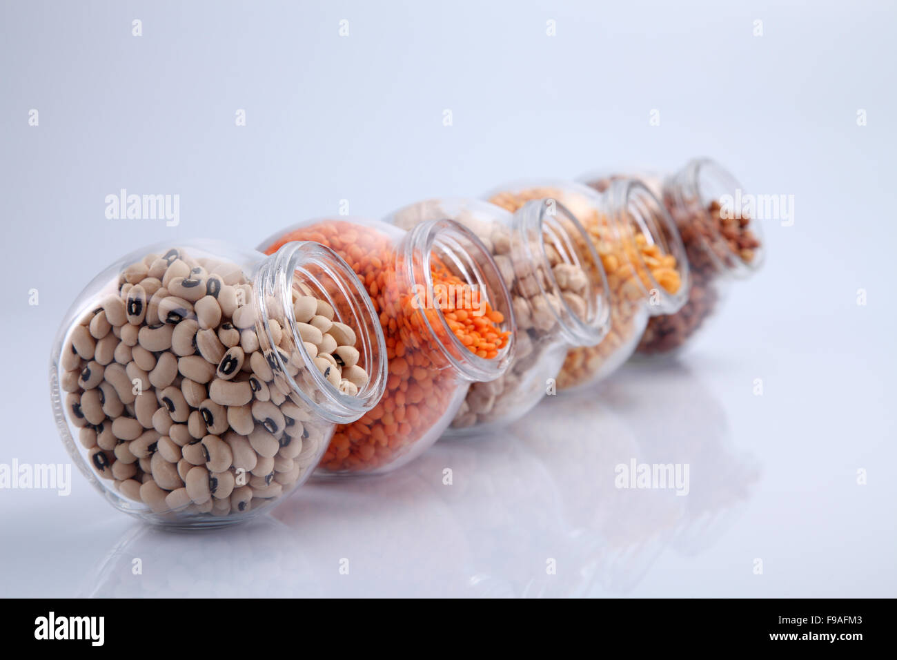 assorted beans in a galss container Stock Photo - Alamy
