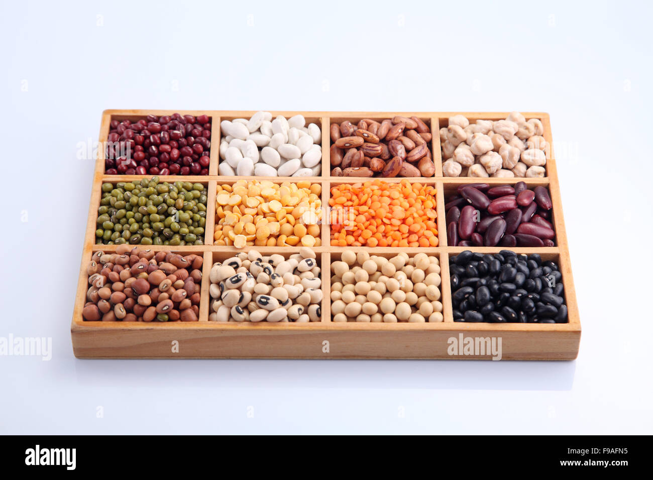 various beans contained in wood boxes Stock Photo - Alamy