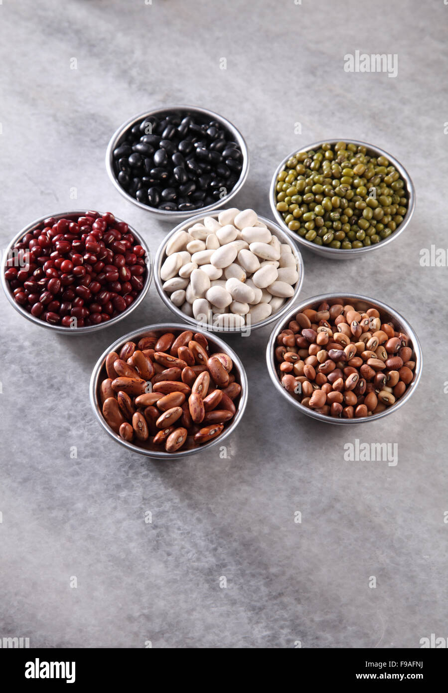 top view of assorted bean on a marble table Stock Photo - Alamy