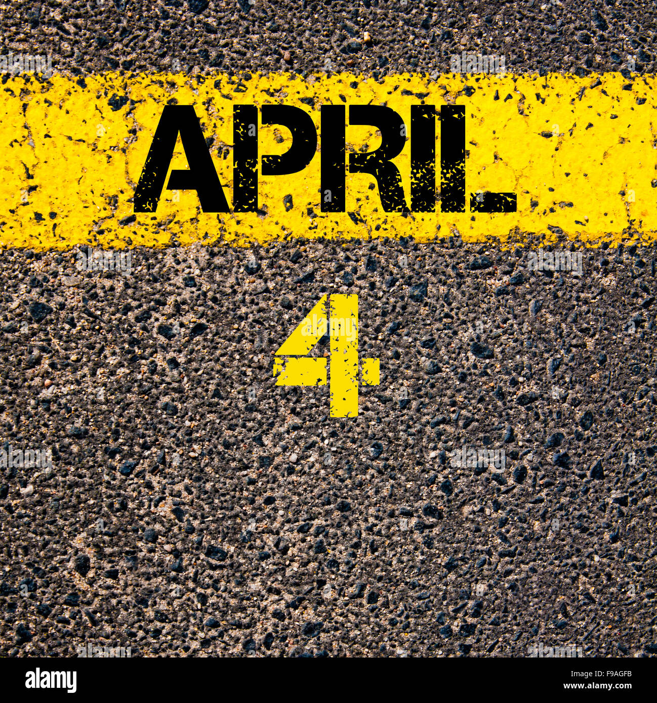 4 April calendar day written over road marking yellow paint line Stock ...
