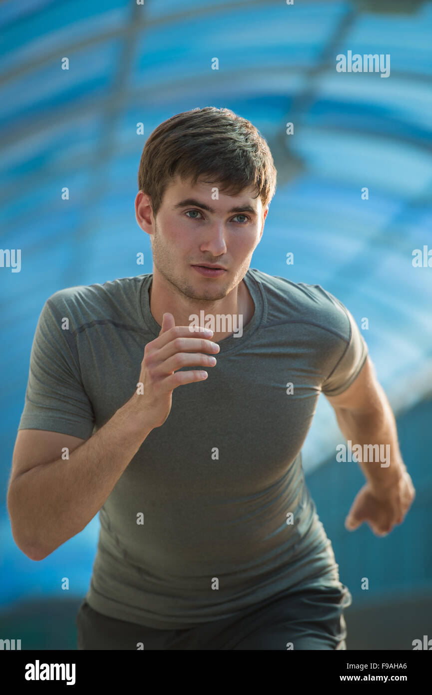 Young man jogging in foot hi-res stock photography and images - Alamy