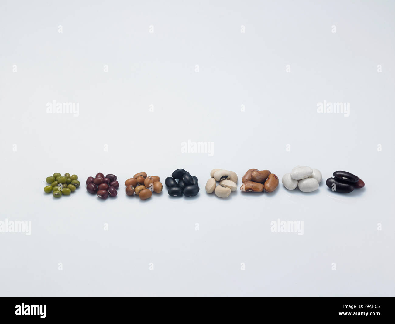 assorted beans arranged in a row Stock Photo - Alamy