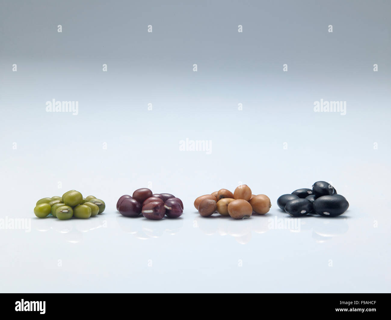 assorted beans arranged in a row Stock Photo - Alamy