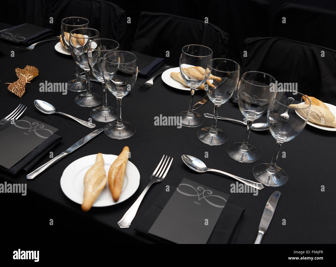 Dishware set in a restaurant table horizontal Stock Photo - Alamy